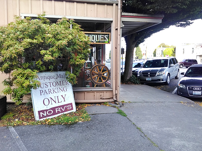 A ship's wheel in the window hints at the nautical treasures within. This place is basically a museum where everything's for sale.
