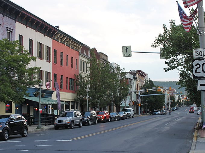 The American flag waves proudly over Pottsville's colorful row of affordable apartments. Like finding vintage treasures at yesterday's prices&mdash;charming spaces that won't send your bank account into therapy!