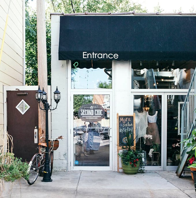 Second Chic: "More sales inside!" promises the chalkboard, and who are we to argue with such delightful honesty?