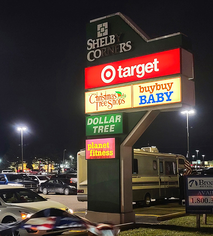 Even after sunset, those colorful store signs glow like beacons guiding bargain seekers to retail paradise.