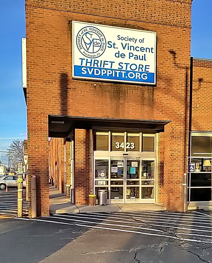 Saint Vincent de Paul's storefront whispers promises of vintage treasures and community spirit combined perfectly.