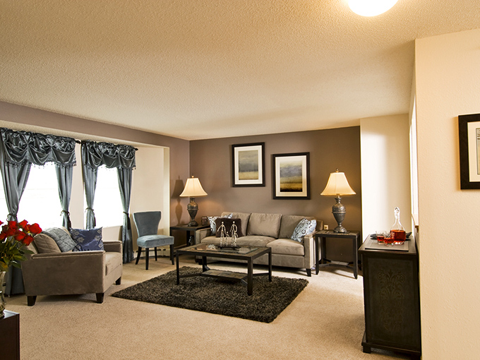 Cozy living spaces designed for comfort, not Instagram. Finally, a place where you can put your feet up without judgment!