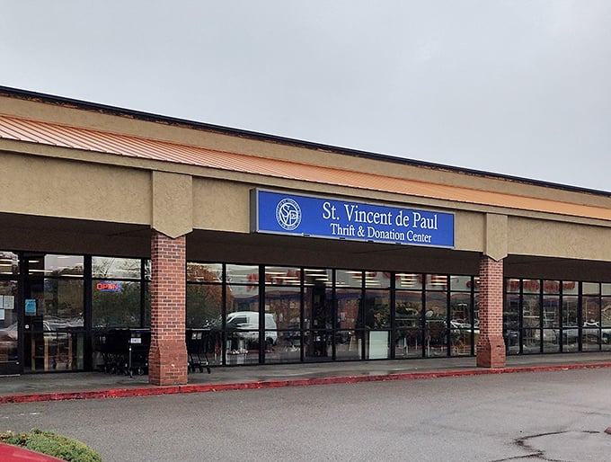 The blue and white storefront beckons like a beacon for anyone seeking affordable vintage treasures.