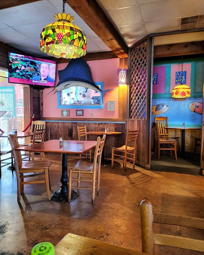 Step inside The Ketch and those colorful lamps transform dinner into a cozy maritime adventure without the seasickness.