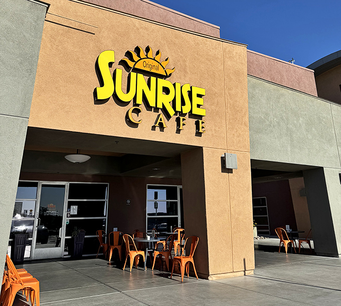 A local favorite hiding in plain sight, Sunrise Cafe's sunny logo is a beacon for breakfast enthusiasts.