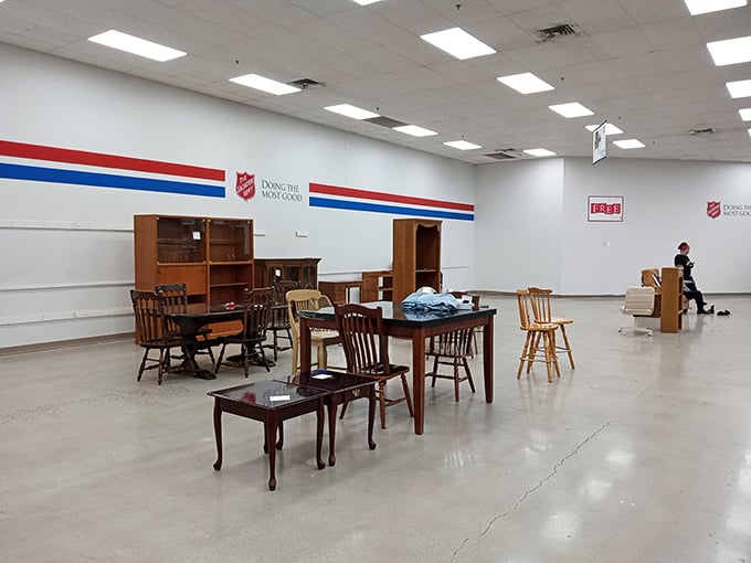 Wooden chairs waiting for their forever homes. This furniture section at Salvation Army tells stories of dinners past and future.