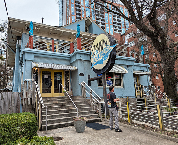 Multi-level outdoor seating with string lights creates the perfect backdrop for cracking shellfish and making messy, happy memories.