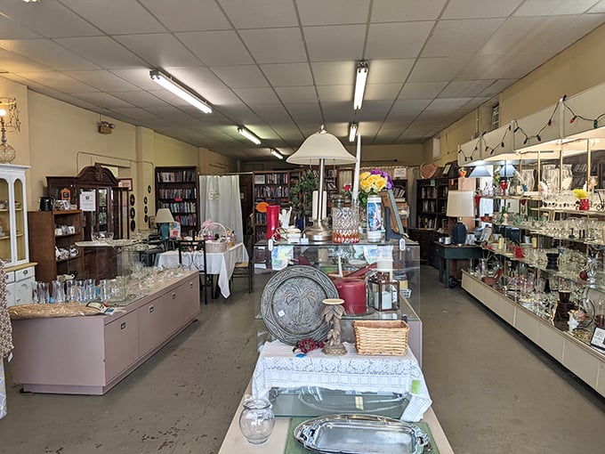 Glassware gleaming under fluorescent lights &ndash; This & That's interior is a carefully organized collector's paradise.