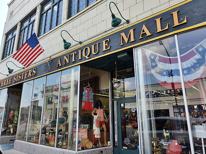 The classic antique shop exterior hints at the carefully curated treasures waiting just beyond those inviting doors.
