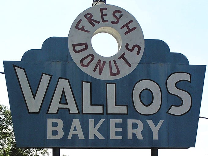 The "Fresh Donuts" sign isn't just advertising&mdash;it's practically a beacon calling all sugar lovers home.