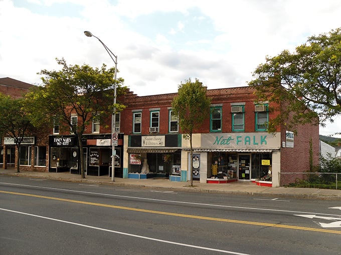A row of brick storefronts in downtown Ware showcases the town&rsquo;s old-fashioned charm, where local businesses keep the community spirit alive.