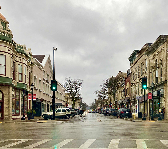Historic storefronts line the street like old friends, proving that character doesn't require a character-sized mortgage.