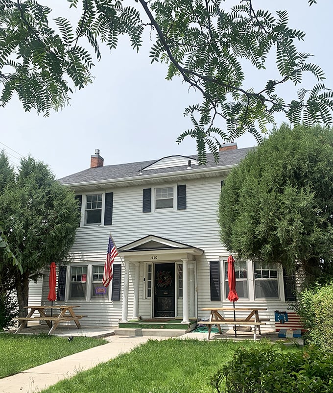 Charming residential neighborhoods where American flags fly proudly and neighbors still wave from their front porches.