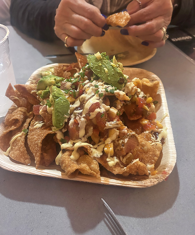 Ahi tuna nachos prove that sometimes the best ideas come from ignoring all the culinary rules completely.