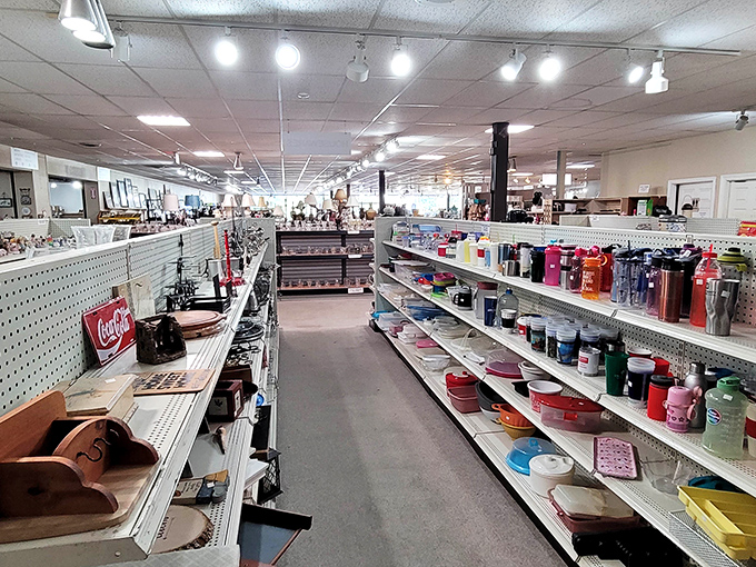 Colorful kitchenware lines both sides of this aisle, a rainbow of culinary possibilities. That red mixing bowl? It's seen more cake batter than a bakery.
