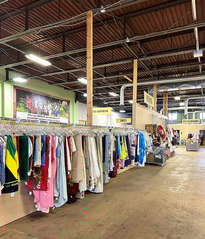 The high ceilings and warehouse lighting turn bargain hunting into a proper retail adventure, not a closet crawl.