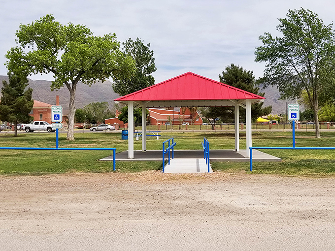 This shaded park pavilion isn't just a place to escape the sun—it's community central where friendships bloom without membership fees.