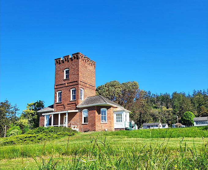 Alexander's Castle stands like a storybook illustration come to life, its brick tower seemingly transported from medieval Europe to this Pacific Northwest paradise.