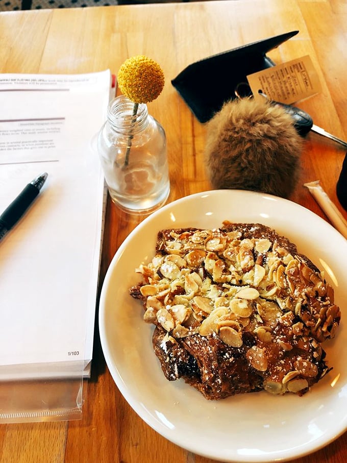 This almond croissant isn't just topped with nuts&mdash;it's wearing a crown fit for pastry royalty, with caramelized edges that crackle like nature's candy.