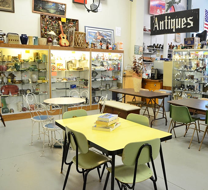 Mid-century furniture paradise! That yellow Formica table whispers tales of countless family dinners and homework sessions from decades past.