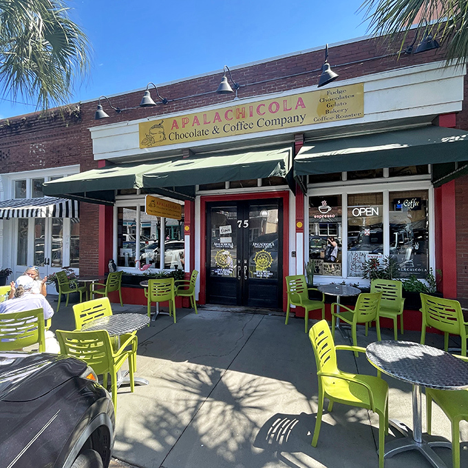 The Apalachicola Chocolate & Coffee Company—where morning motivation comes with a side of small-town conversation and lime-green chairs.