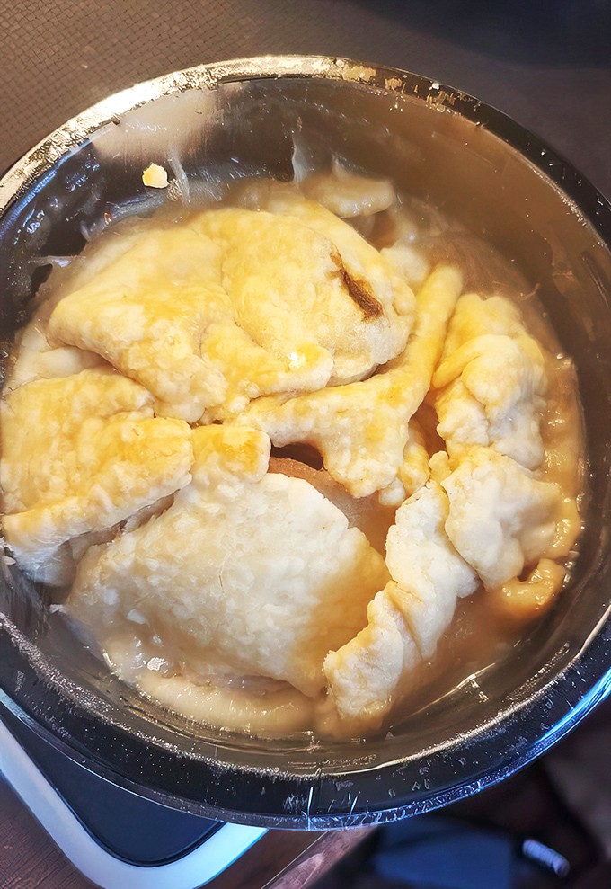 Pillowy dumplings swimming in golden broth&mdash;proof that simplicity, when done right, outshines fancy cuisine every time.