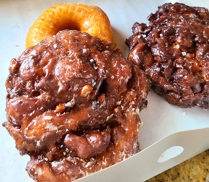 The legendary apple fritters&mdash;irregular masterpieces of crispy exterior and tender, apple-studded interior. Worth every calorie and possibly a detour from your diet.
