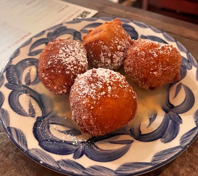 Golden-fried pillows of joy dusted with powdered sugar. These apple-ricotta donuts don't just speak Italian; they sing opera to your taste buds.