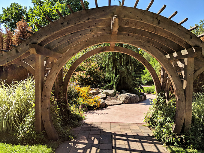 Portal to another world? This wooden archway invites you to step through and leave your worries behind.