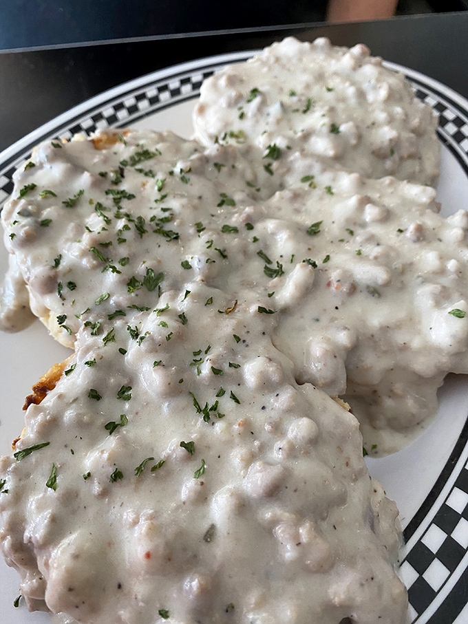 Behold the star attraction: biscuits and gravy that could make a grown adult weep with joy. That creamy, sausage-studded gravy deserves its own fan club.