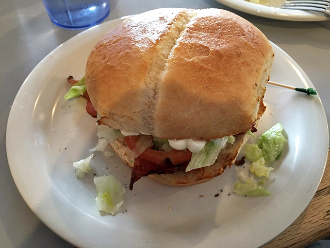 This BLT isn't just a sandwich&mdash;it's architecture with purpose. Crisp lettuce, juicy tomato, and bacon that snaps like a perfect punchline.