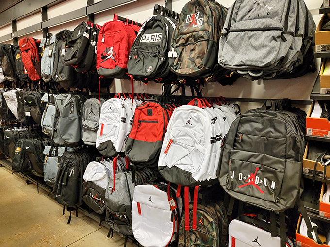 An impressive wall of Jordan backpacks &ndash; because even your gym clothes deserve to travel first class.