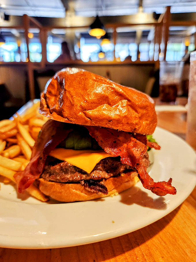 Behold the legendary Bacon Avocado Burger in all its glory—where crispy meets creamy in a handheld masterpiece that deserves its own California postal code.