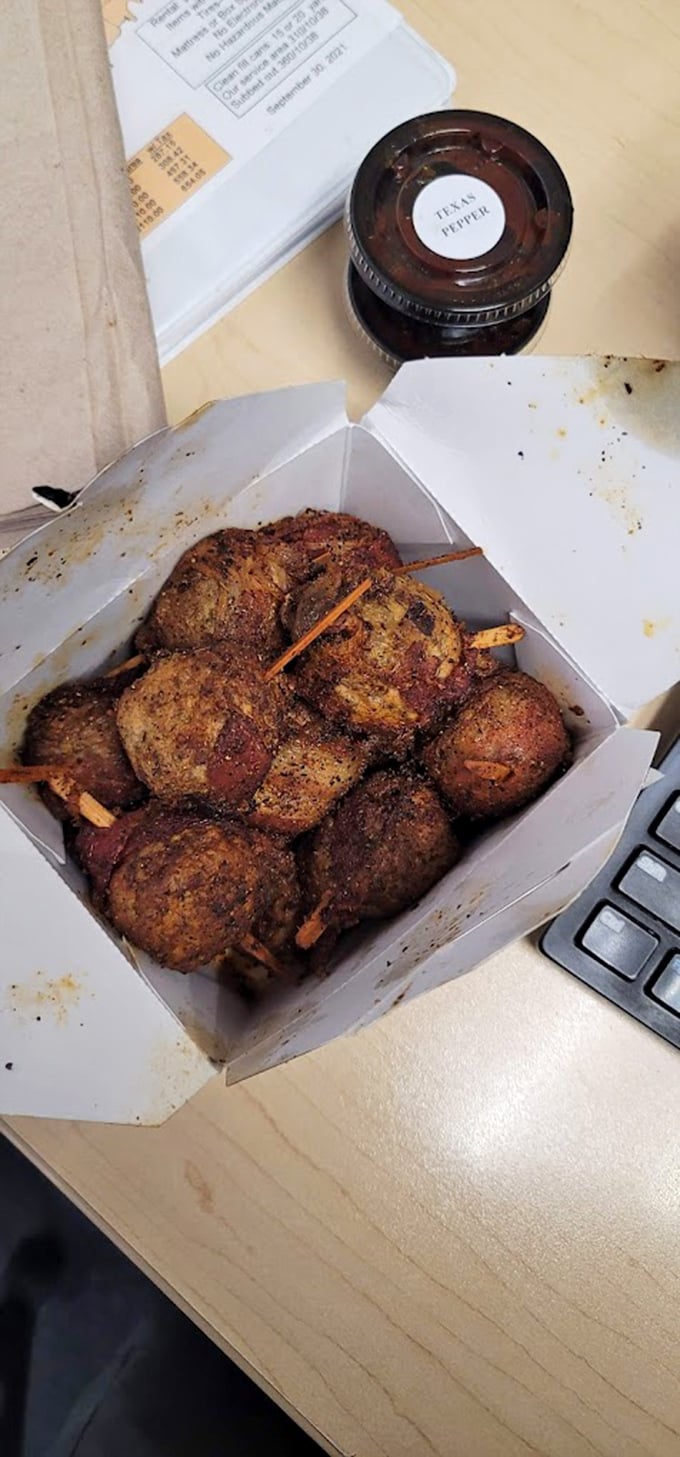 These Moink Balls aren't just meatballs; they're bacon-wrapped flavor bombs that'll make you question all other appetizers you've ever known.