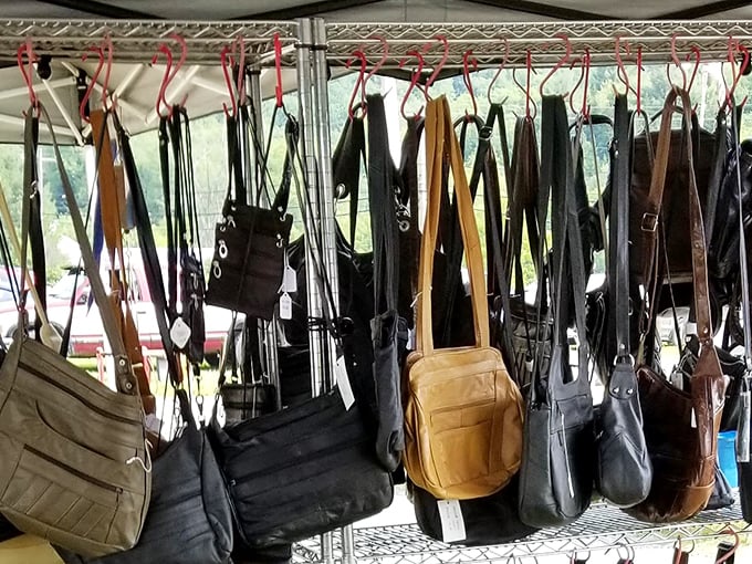 Hanging leather bags sway gently in the breeze, each one ready to carry your finds home with actual character.