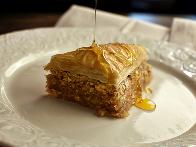Honey cascades down layers of phyllo like a sweet waterfall. This baklava doesn't just speak to you &ndash; it sings.