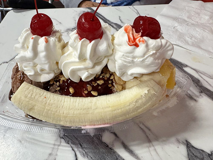 Behold the Monster Banana Split in all its glory&mdash;three scoops nestled in a banana boat, crowned with whipped cream and cherries like royalty.