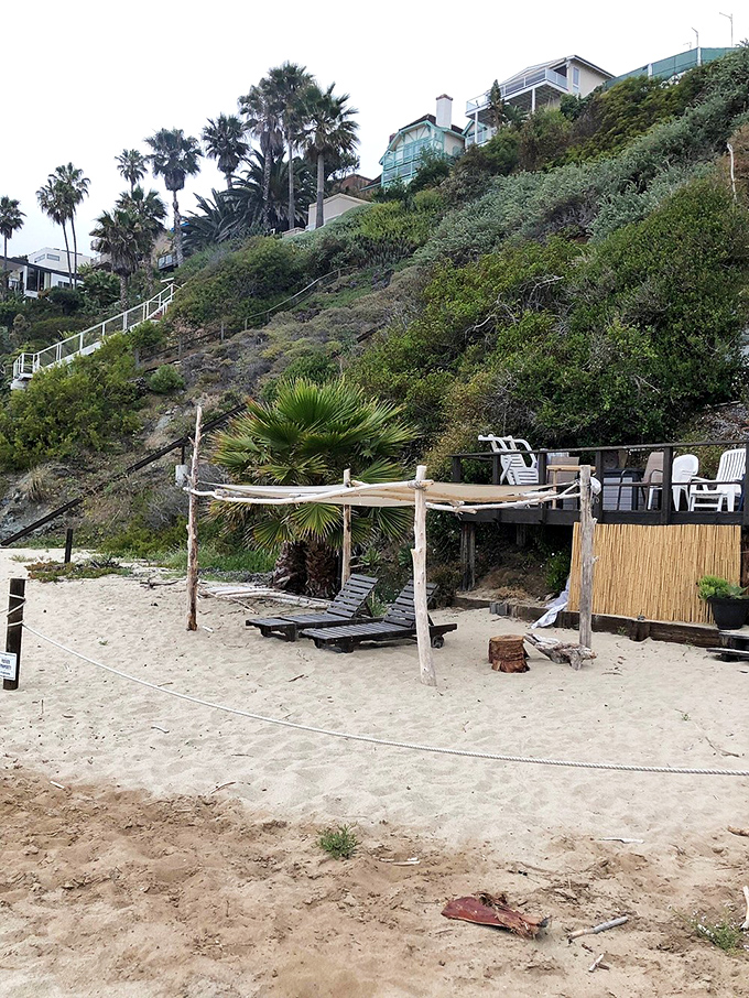 Beach real estate at its finest—a rustic palm-frond canopy that makes even five-star resorts seem unnecessarily complicated.