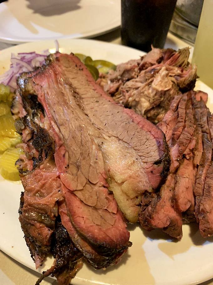 Behold the brisket in all its glory &ndash; that pink smoke ring isn't just pretty, it's a diploma from the University of Low-and-Slow.