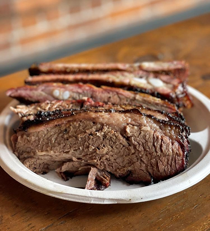 Behold, the brisket of your dreams. That perfect smoke ring and peppery bark aren't just photogenic&mdash;they're edible evidence of barbecue mastery.