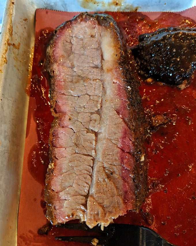 Behold the holy grail of Texas barbecue&mdash;brisket with a perfect smoke ring, rendered fat that glistens like jewelry, and bark so beautiful it belongs in a museum.