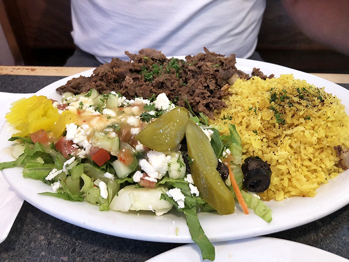 Behold the beef shawarma in all its wrapped glory—this is what pita bread dreams of becoming when it grows up.