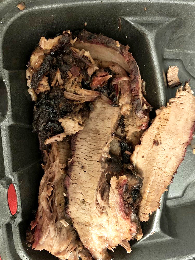 Behold the brisket that launched a thousand food comas &ndash; perfectly pink, gorgeously crusted, and absolutely irresistible.