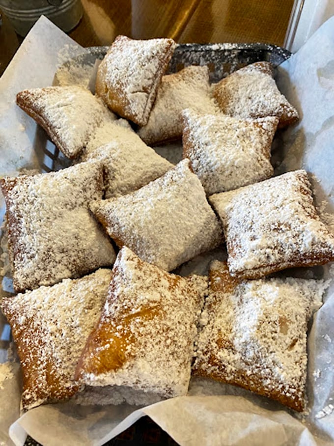 These powdered sugar-dusted beignets aren't just pastries; they're little pillows of joy that would make New Orleans proud. Diet plans, beware. 