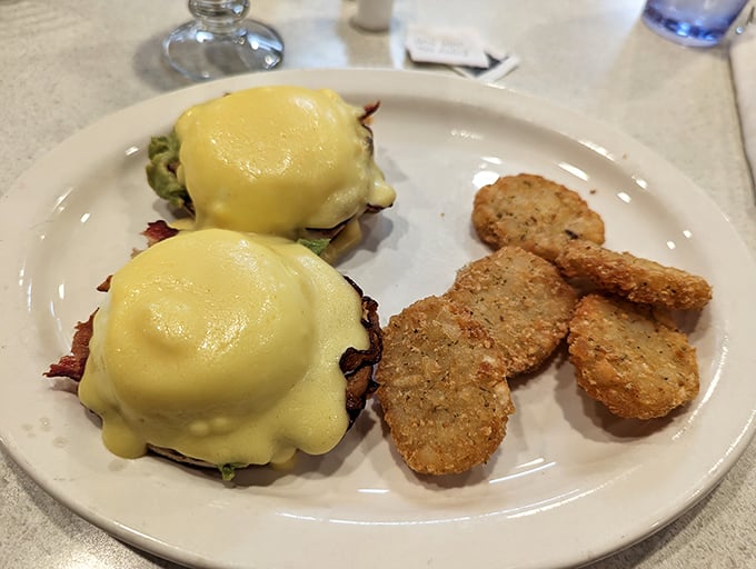 These Eggs Benedict aren't just breakfast&mdash;they're edible architecture, with hollandaise cascading like yellow velvet over perfectly poached eggs.