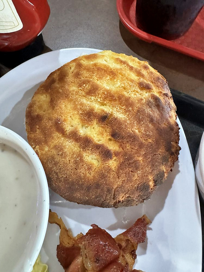 That biscuit smothered in sausage gravy with crispy bacon might just be the most beautiful thing you'll see all day.