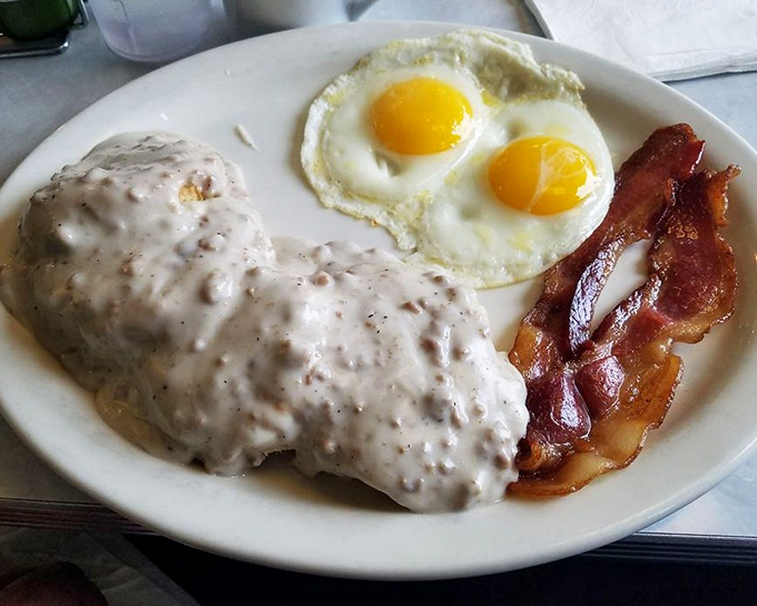 Biscuits and gravy that would make your grandmother both proud and jealous. That pepper-speckled gravy blanket is comfort defined.
