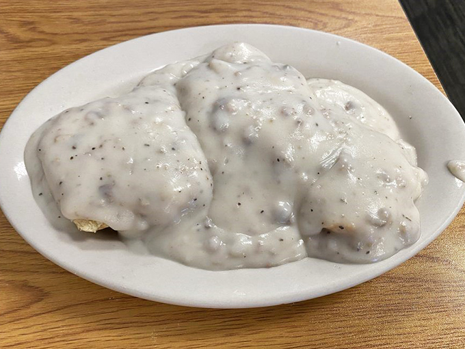 Behold: biscuits and gravy that could make a cardiologist weep—both from professional concern and pure, unbridled envy.