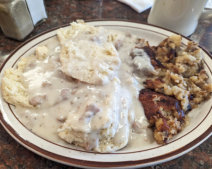 Behold the holy grail&mdash;biscuits and gravy that would make your grandmother both proud and jealous, with hash browns crisped to golden perfection.