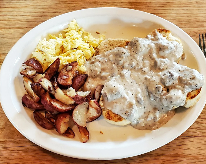 Biscuits and gravy that could start a religion. Fluffy islands of dough swimming in a sea of peppery sausage gravy &ndash; breakfast nirvana has been achieved.